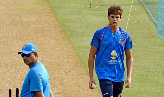 Arjun Tendulkar bowls to Virat Kohli and other indian batsmen in the ...