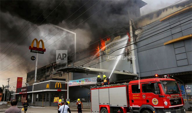 Philippines: One body recovered from mall fire, another 36 feared dead ...