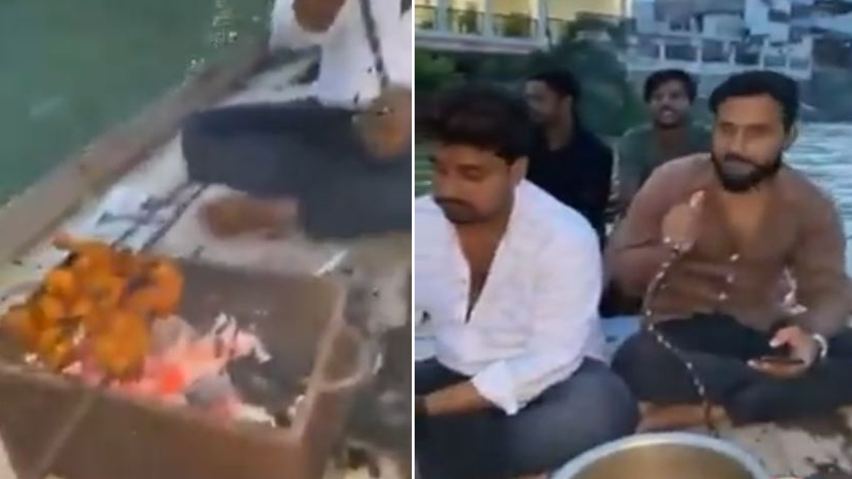 गंगा नदी में चलती नाव पर मांस पकाने और हुक्का पीने का VIDEO वायरल ...